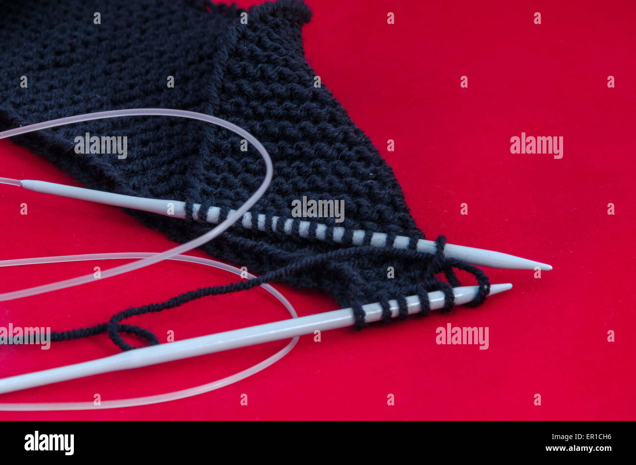 Close-up of hands knitting Stock Photo - Alamy