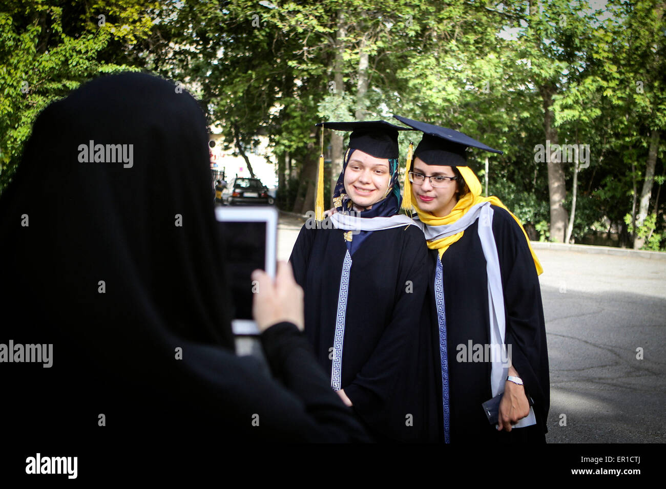 Tehran, Iran. 24th May, 2015. Iranian students pose for photos during ...