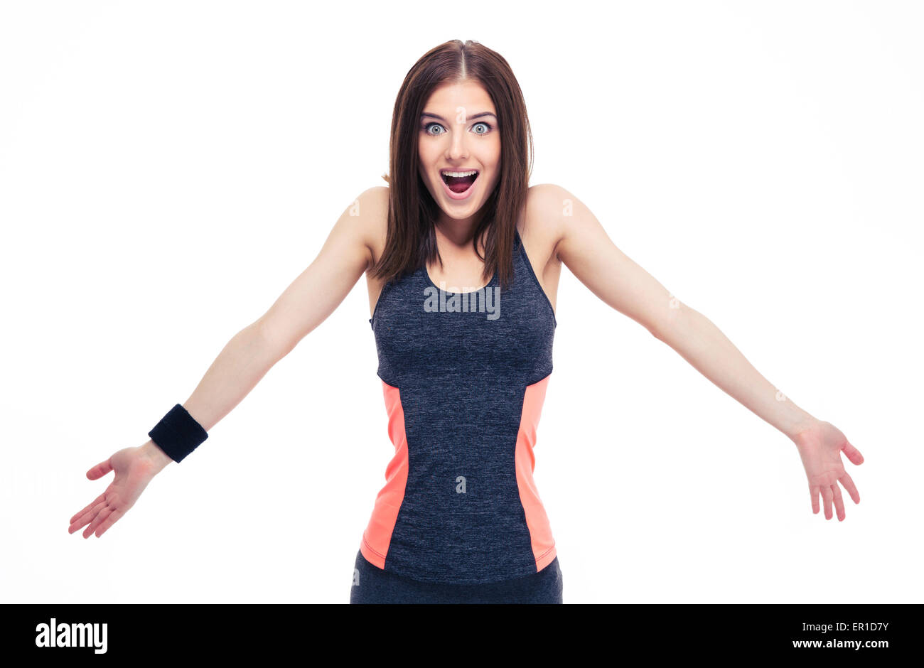 Sporty young surprised woman shrugging her shoulders isolated on a ...