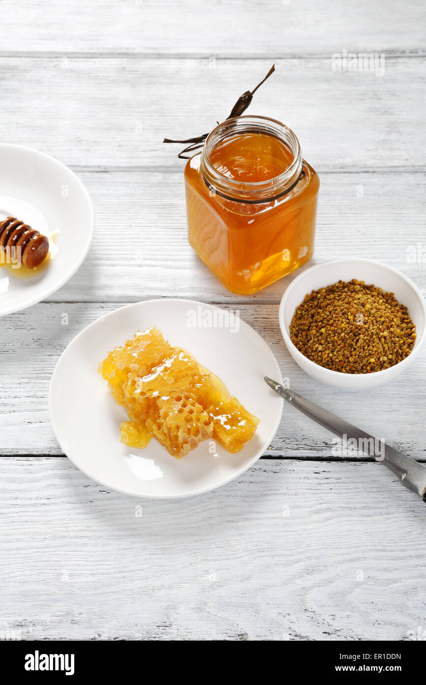 Sweet and fresh honey on the boards, dessert Stock Photo - Alamy