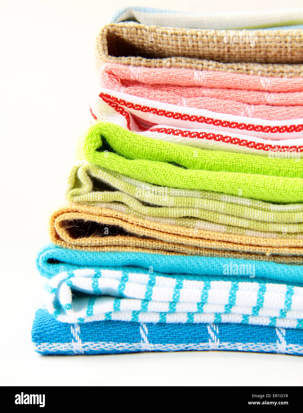 stack of colorful kitchen napkins on white background Stock Photo - Alamy