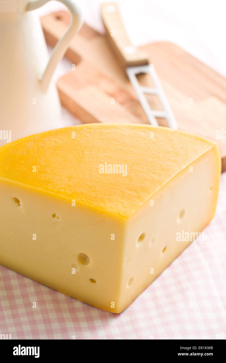 block of edam cheese on kitchen table Stock Photo - Alamy