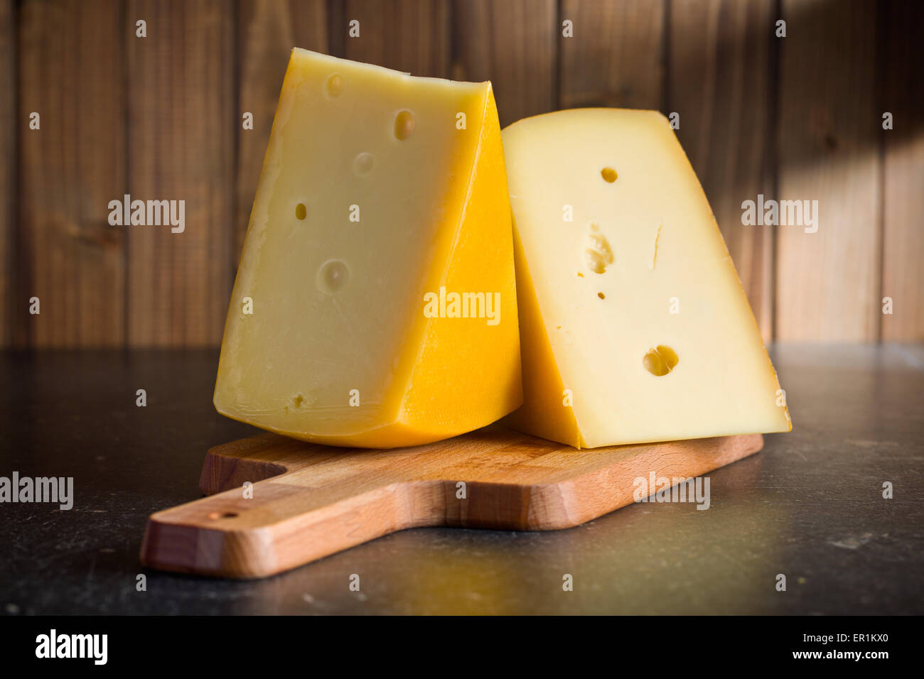 block of edam cheese on kitchen table Stock Photo - Alamy