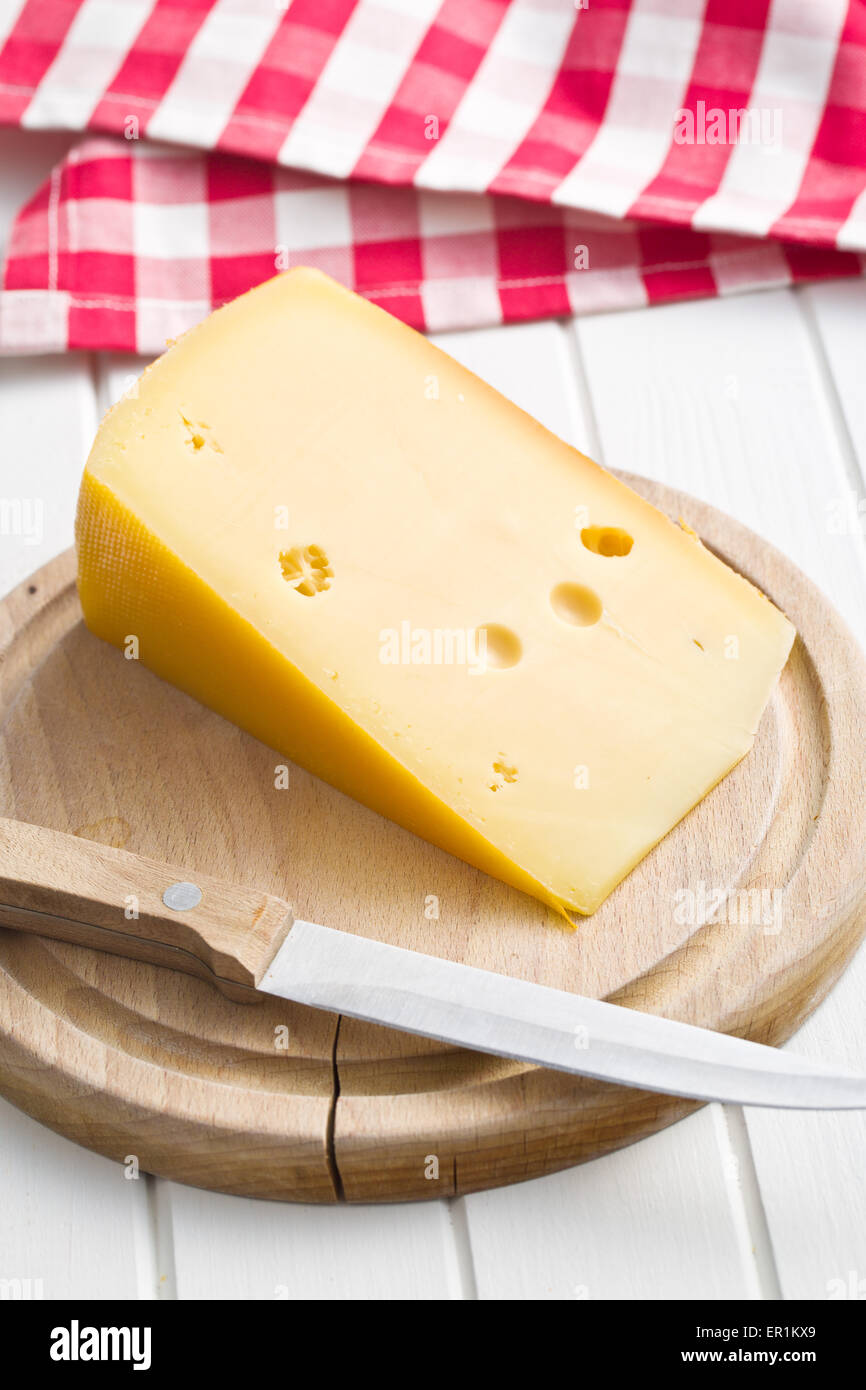 block of edam cheese on kitchen table Stock Photo - Alamy