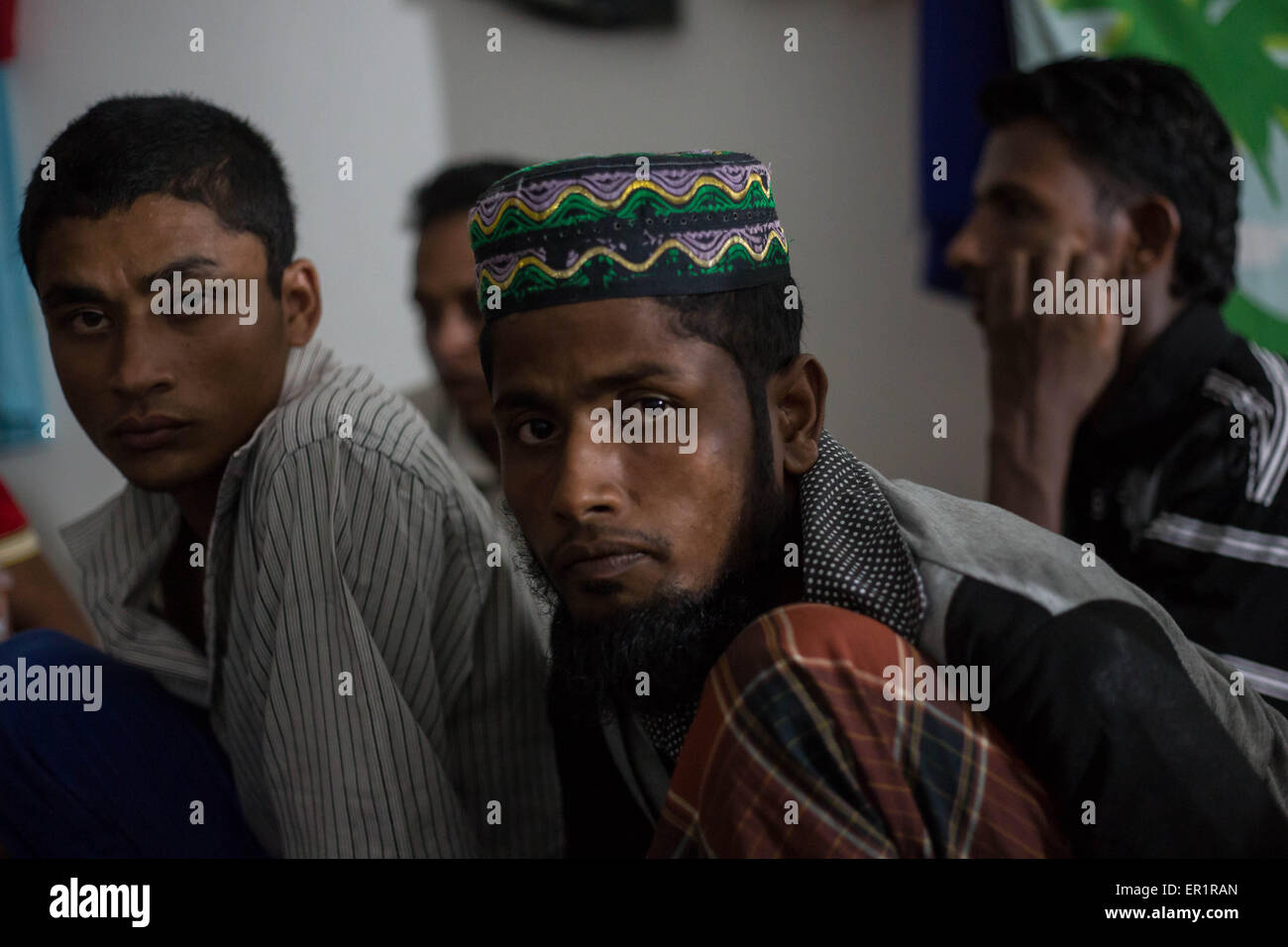 Langkawi, Malaysia. 20th May, 2015. Rohingya men gathered inside an ...