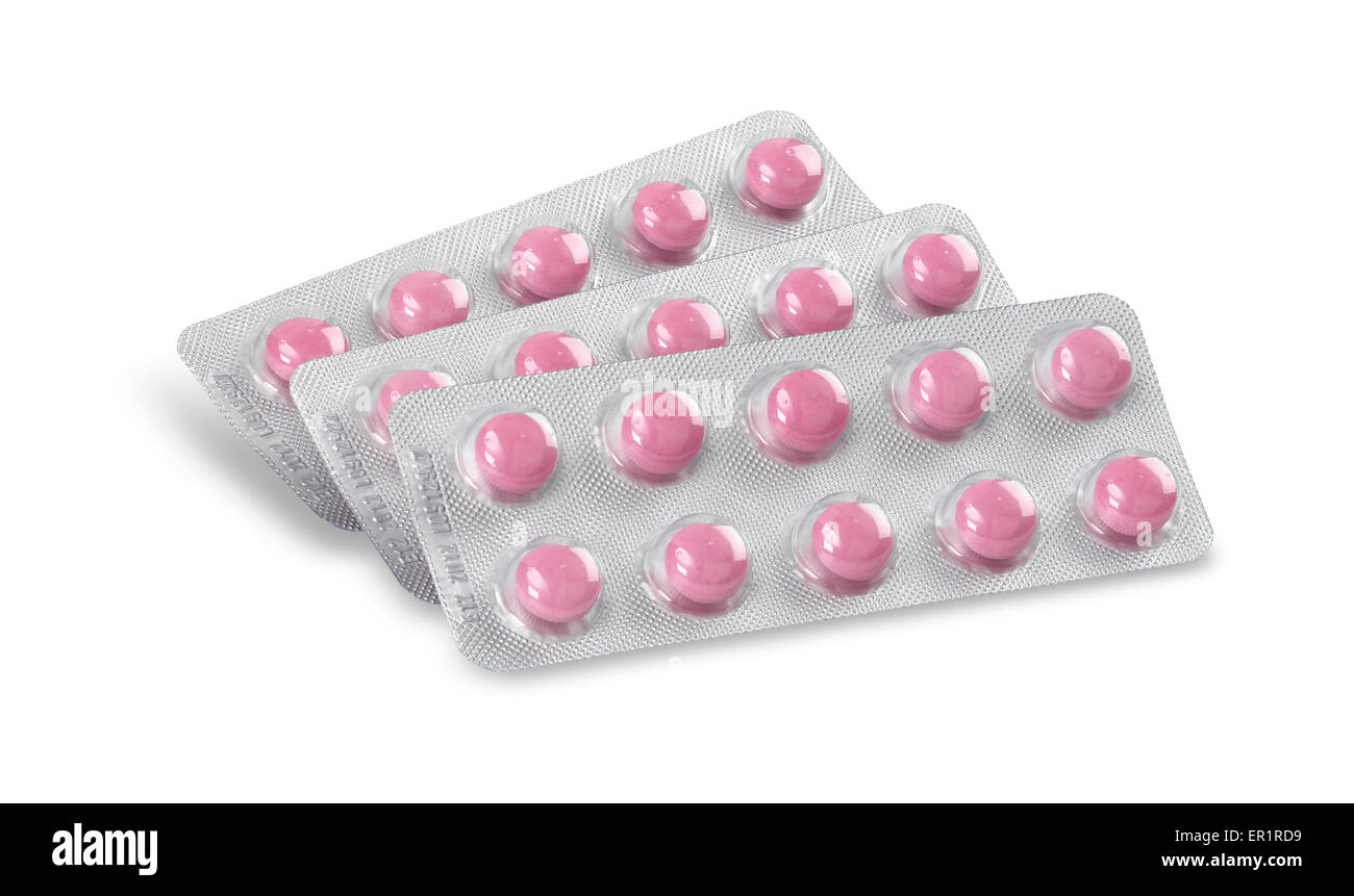 Blister with pink pills isolated on a white background Stock Photo - Alamy