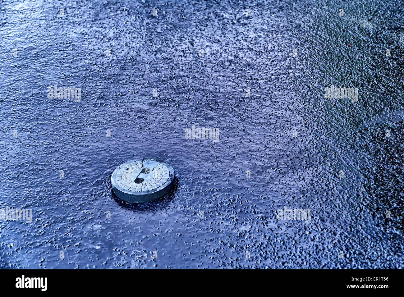 Large manhole cover hi-res stock photography and images - Alamy