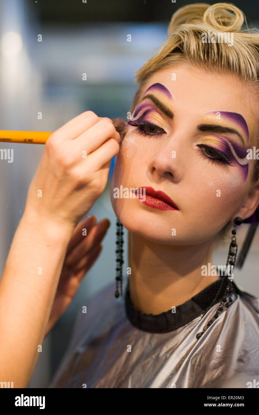 Make-up artist at work Stock Photo - Alamy