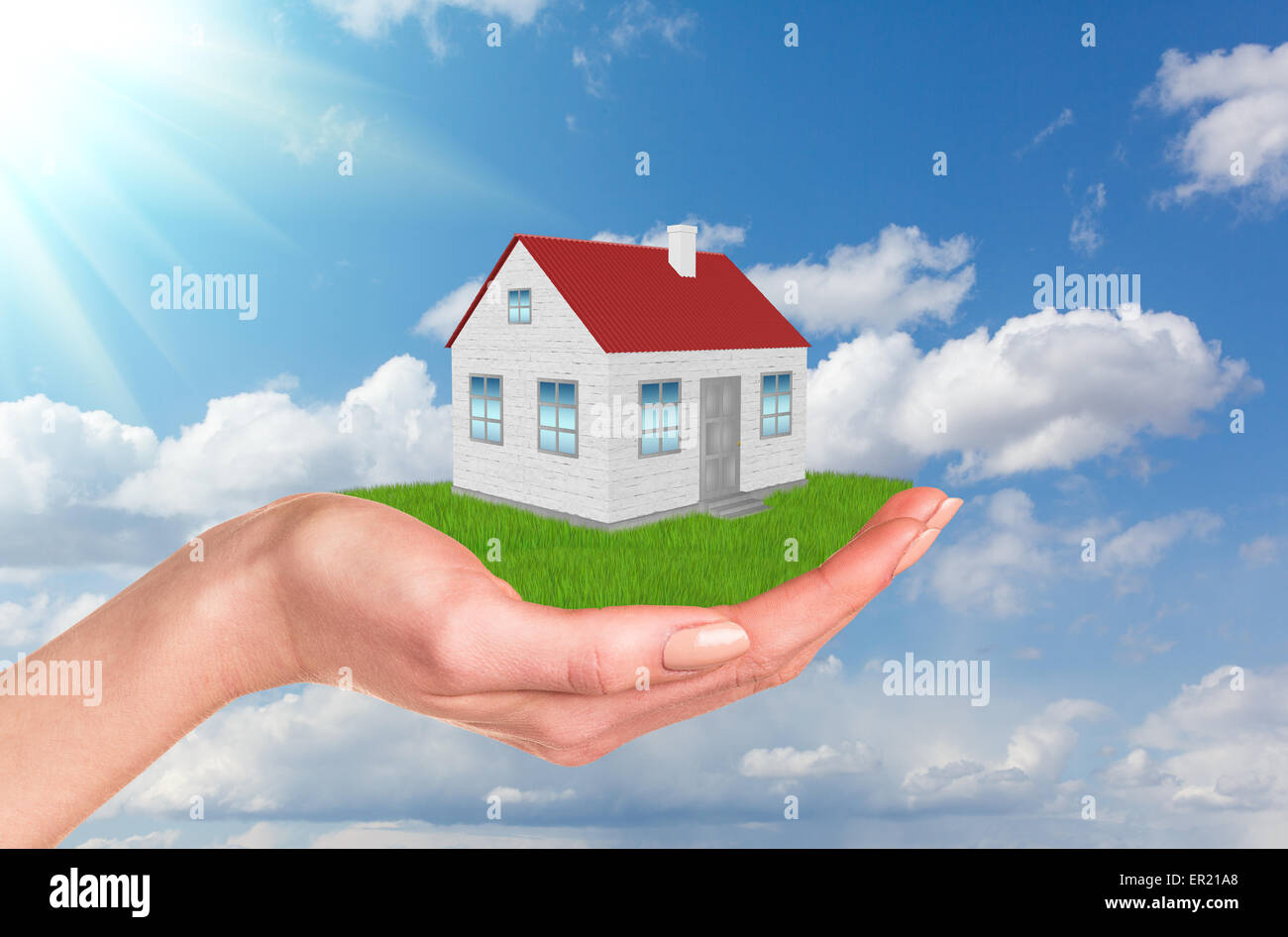 Hand holding house Stock Photo - Alamy