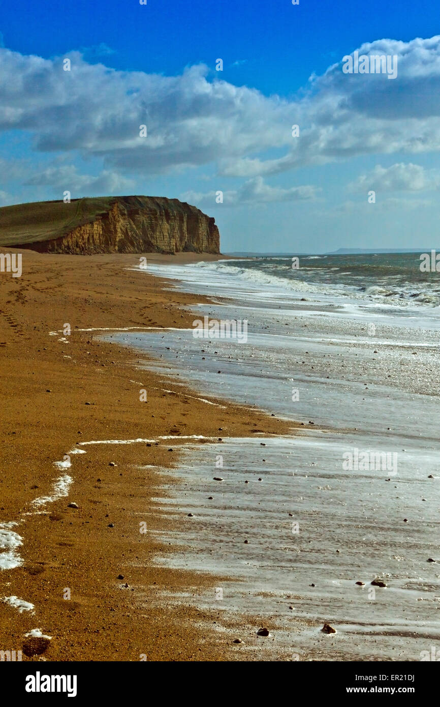 The distinctive banded sandstone strata of Burton Cliff on the Jurassic ...