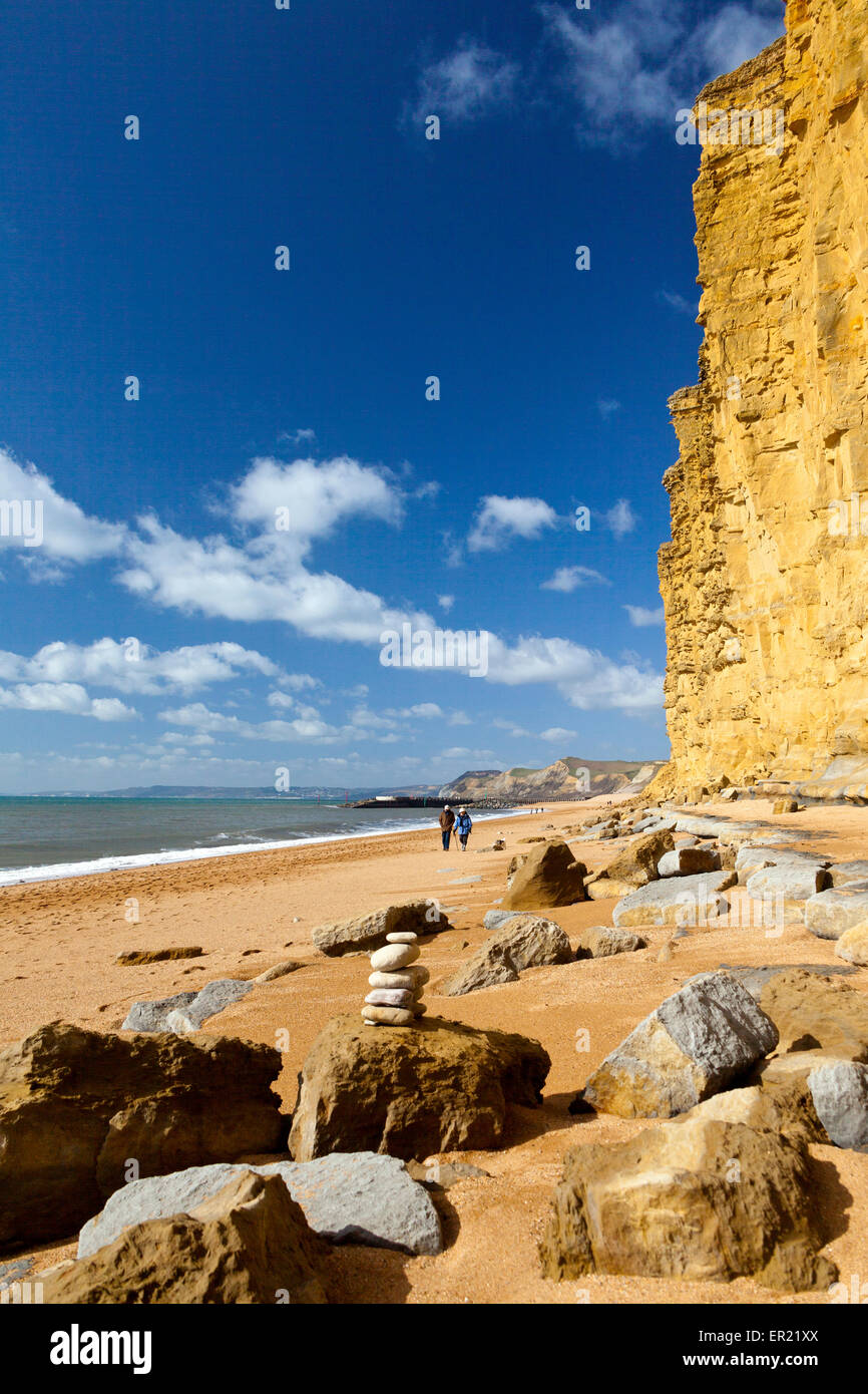 Balancing stones below the distinctive banded sandstone strata of East ...