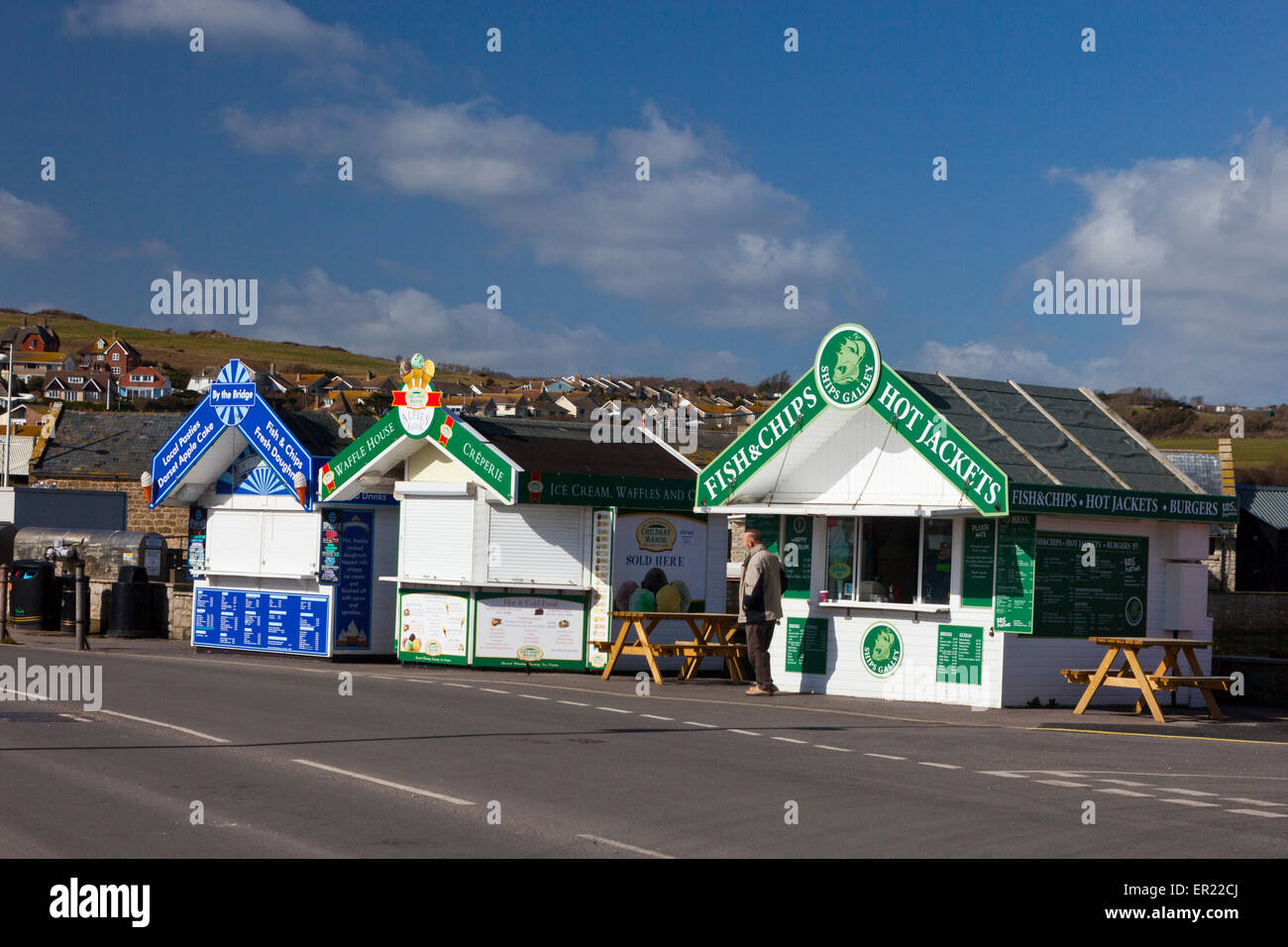 Various fast-food stalls on the harbourside in Werst Bay on the ...