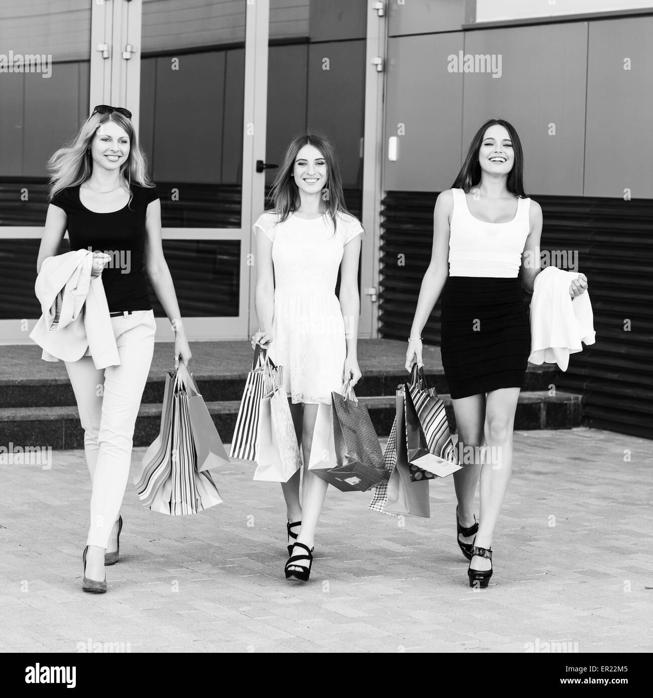 Young women after shopping Stock Photo - Alamy