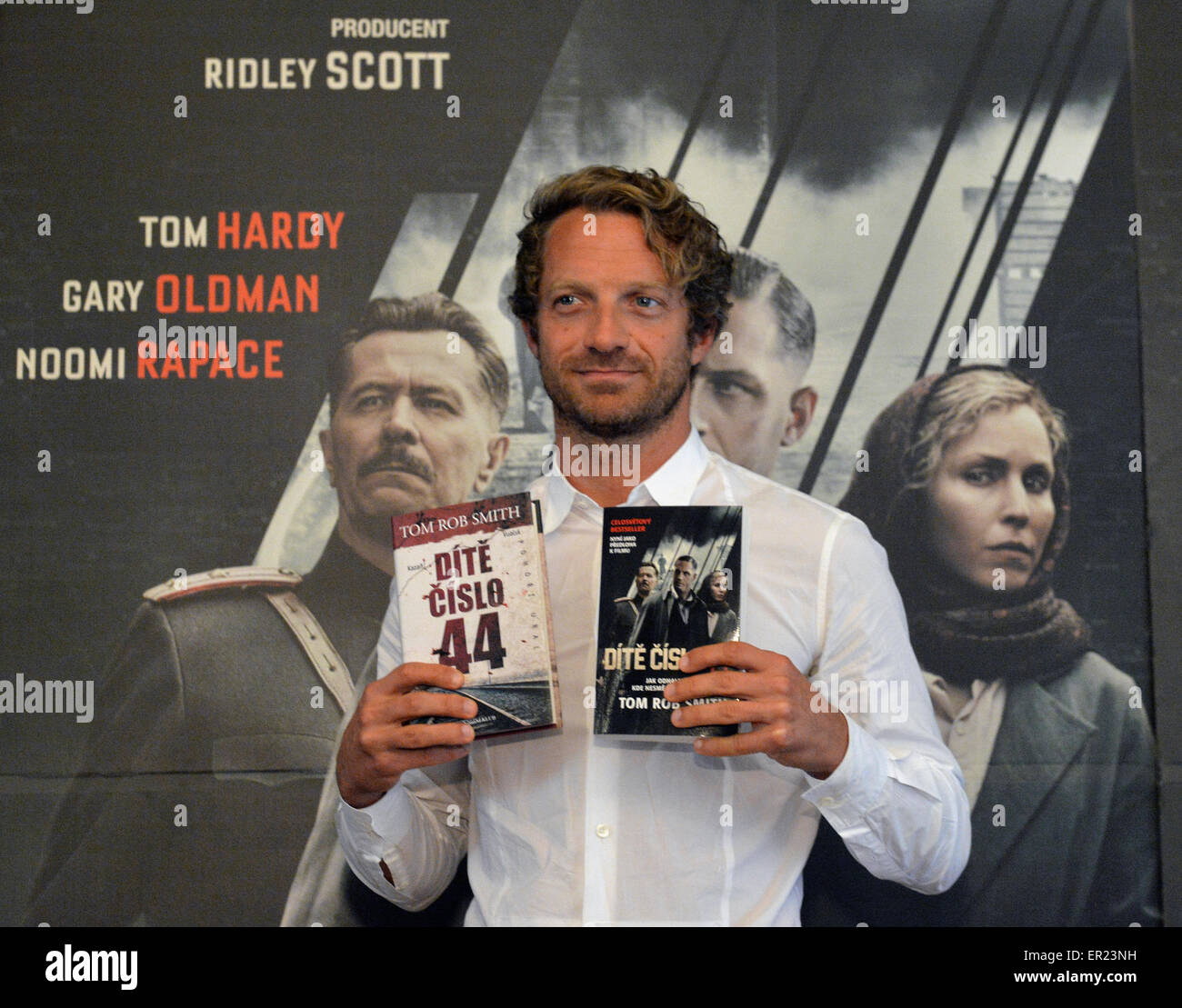 Tom Rob Smith, author of the novel Child 44, poses for media with two ...