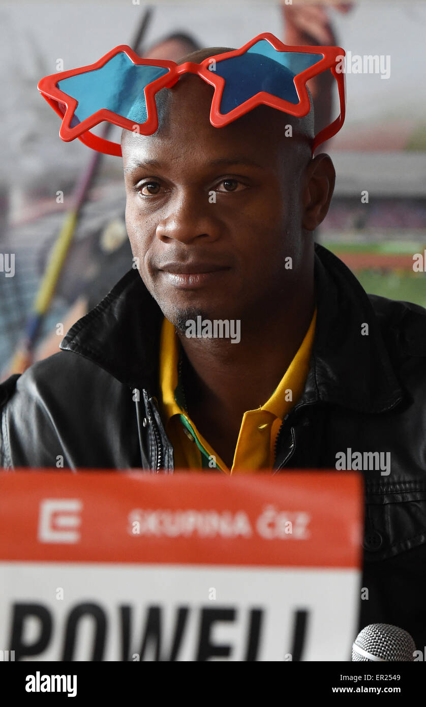 Jamaican sprinter Asafa Powell poses with funny glasses for media prior ...