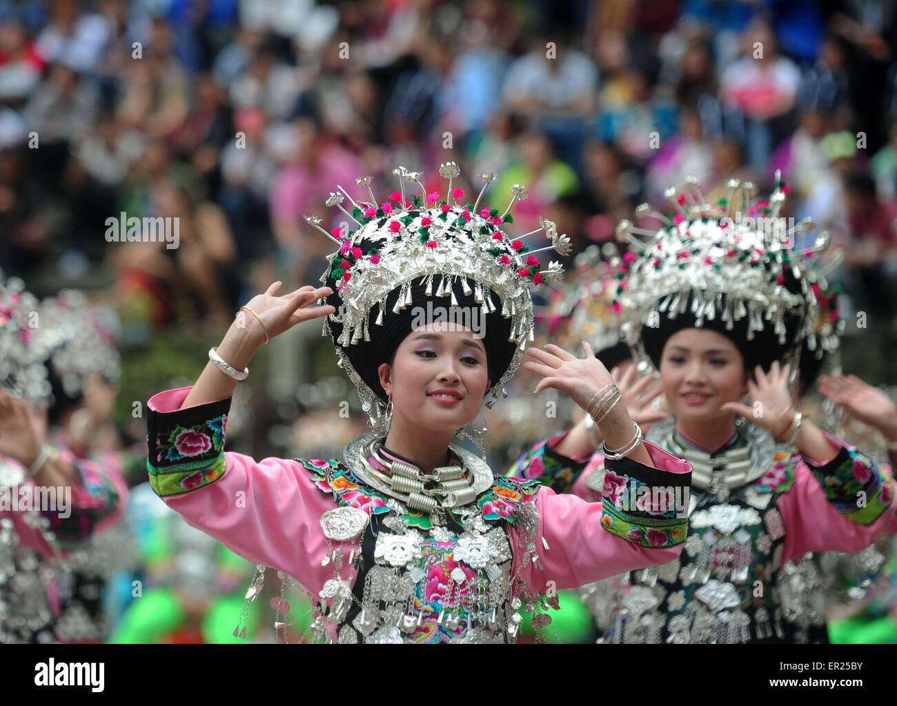 Fenghuang, China. 25th May, 2015. People attend the he 2015 Miao Girl ...