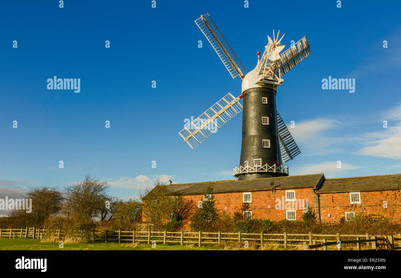 Skidby mill on a fine winter morning with surrounding cottages and ...