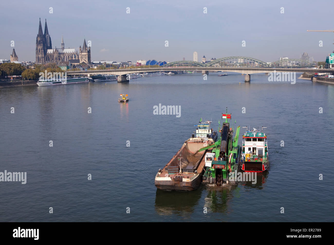 Europe, Germany, Cologne, a dredge deepens the riverbed of the river ...