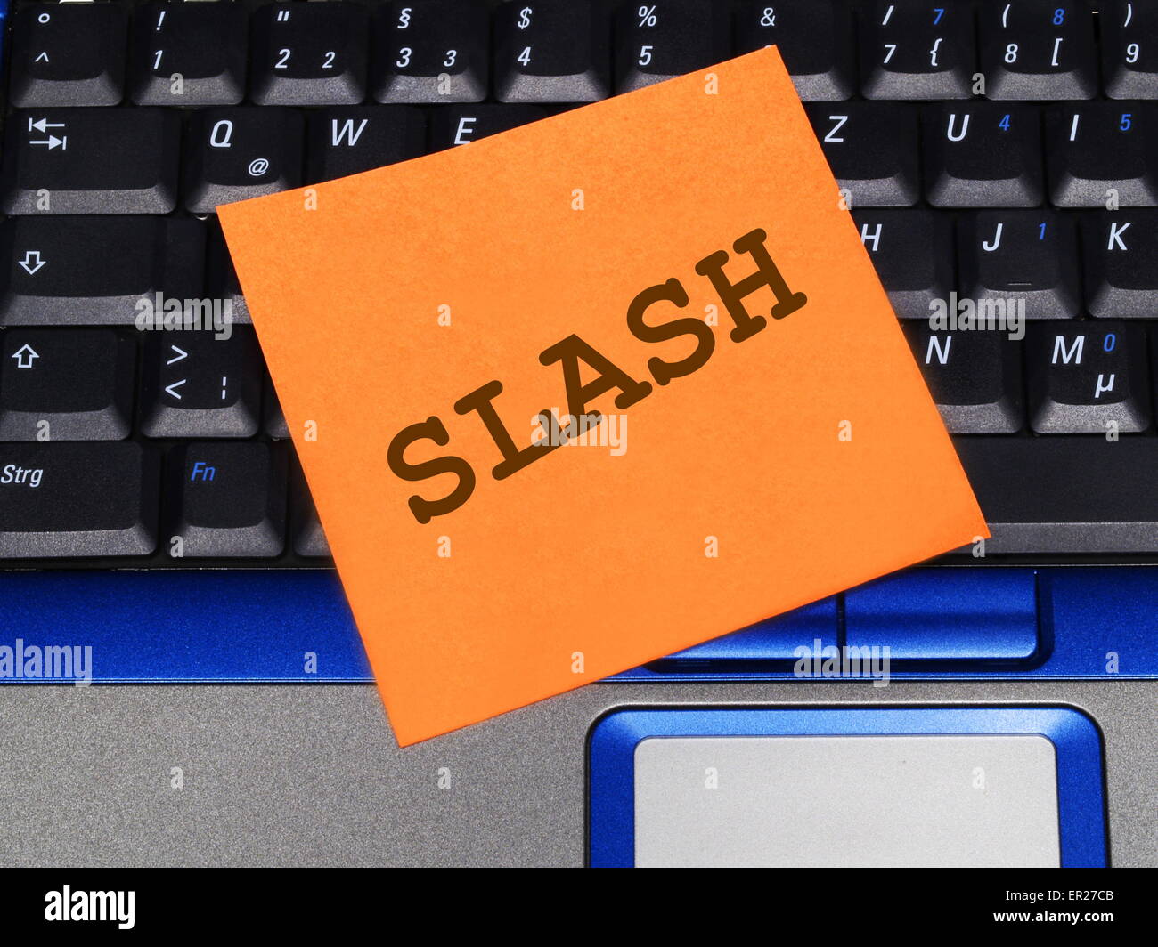 Memo note on notebook, slash Stock Photo - Alamy