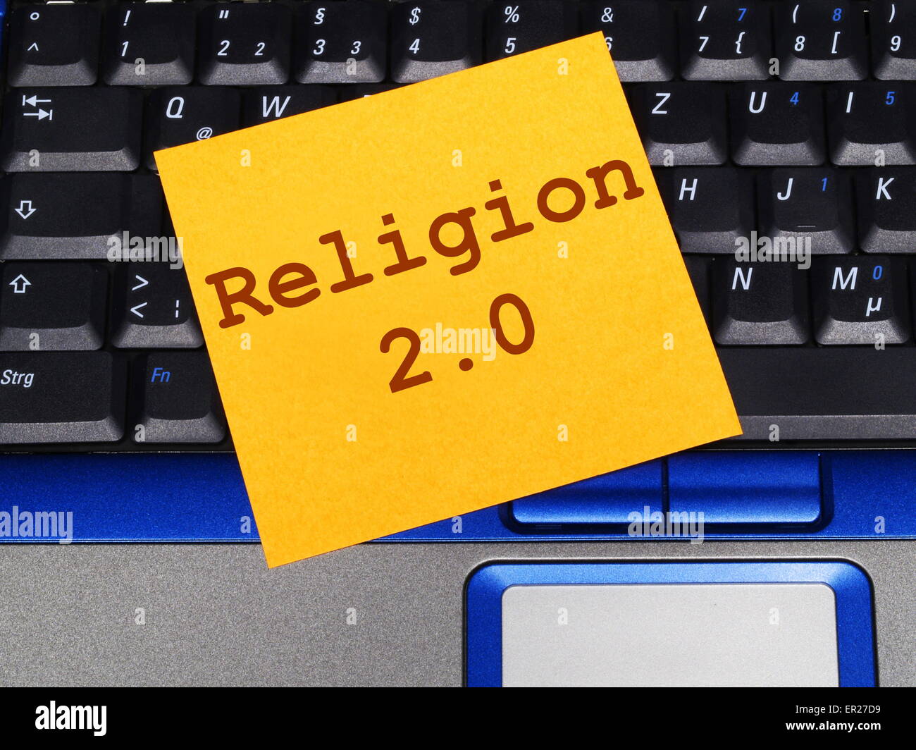 Memo note on notebook, Religion 2.0 Stock Photo - Alamy