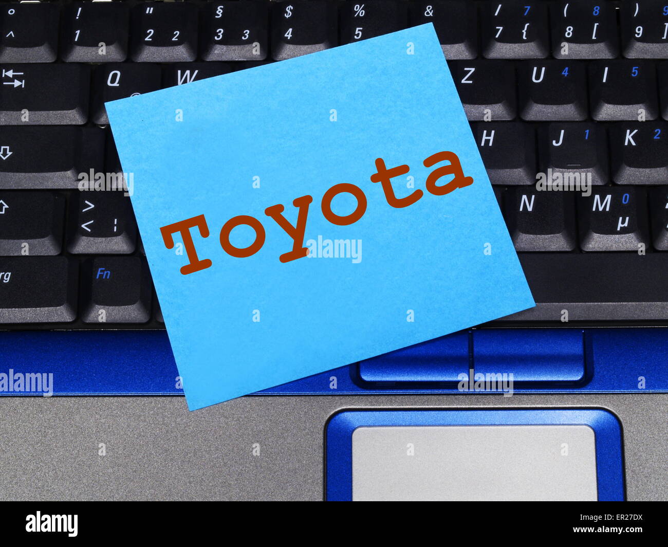 Memo note on notebook, Toyota Stock Photo - Alamy