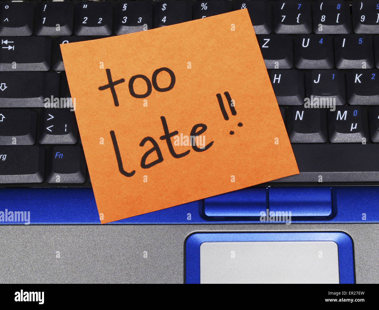 Memo note on notebook, too late Stock Photo - Alamy