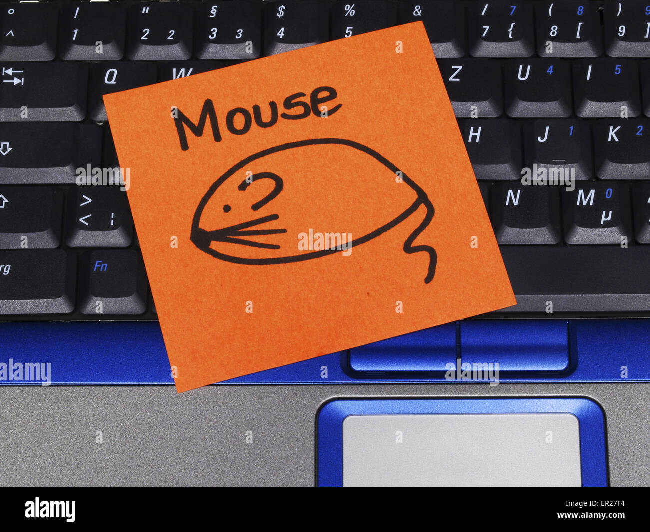 Memo note on notebook, mouse drawing computer mouse Stock Photo - Alamy