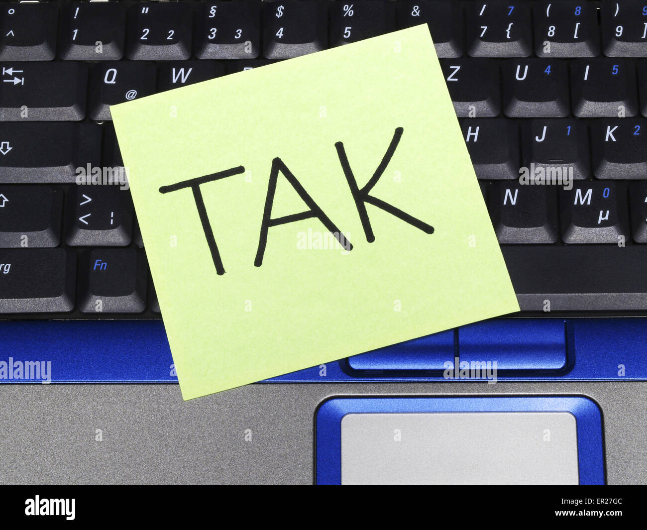 Memo note on notebook, tak Danish thanks Stock Photo - Alamy
