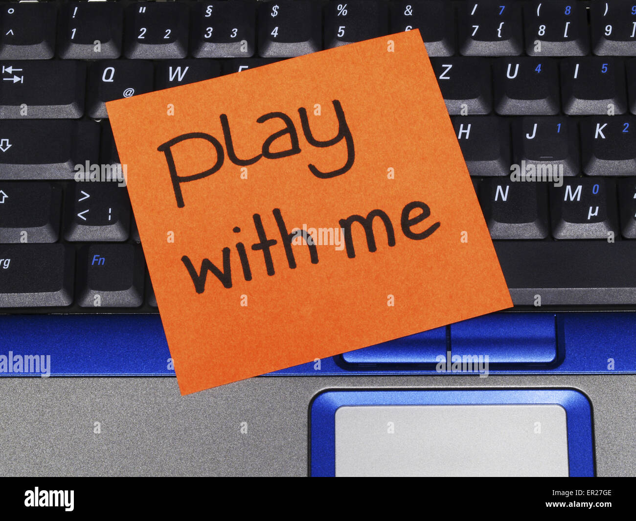 Memo note on notebook, play with me Stock Photo - Alamy