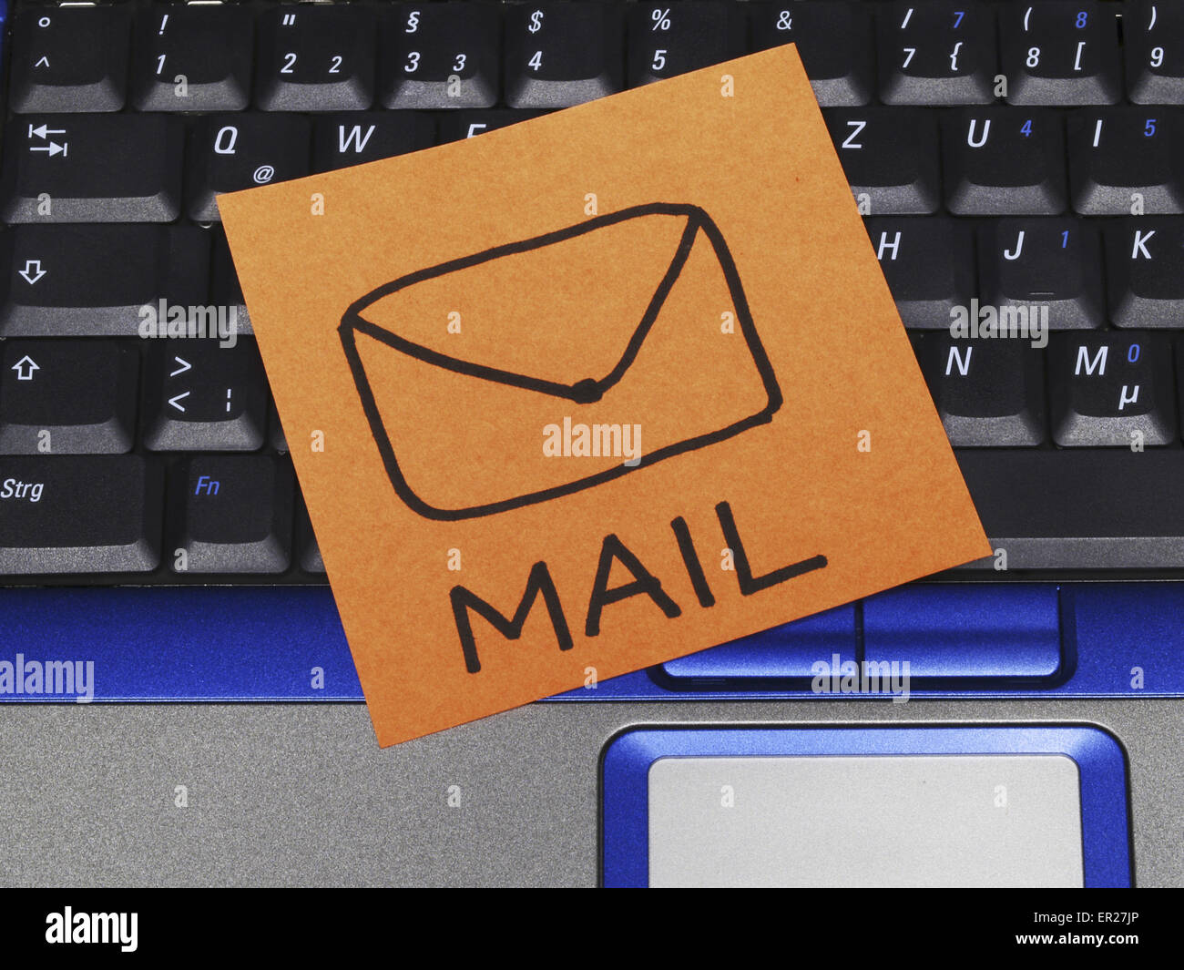 Memo note on notebook, drawing mail Stock Photo - Alamy