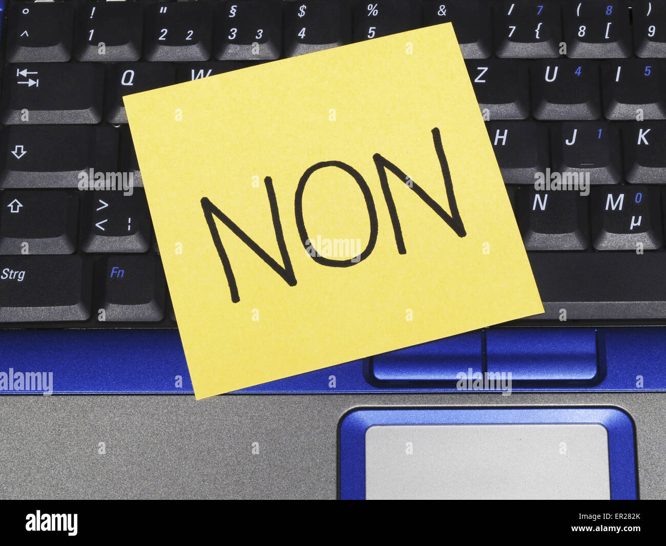 Memo note on notebook, Non, no Stock Photo - Alamy