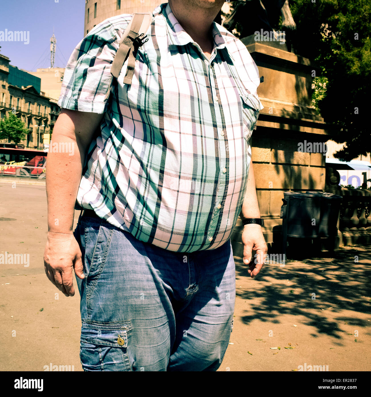 Fat man walking hi-res stock photography and images - Alamy