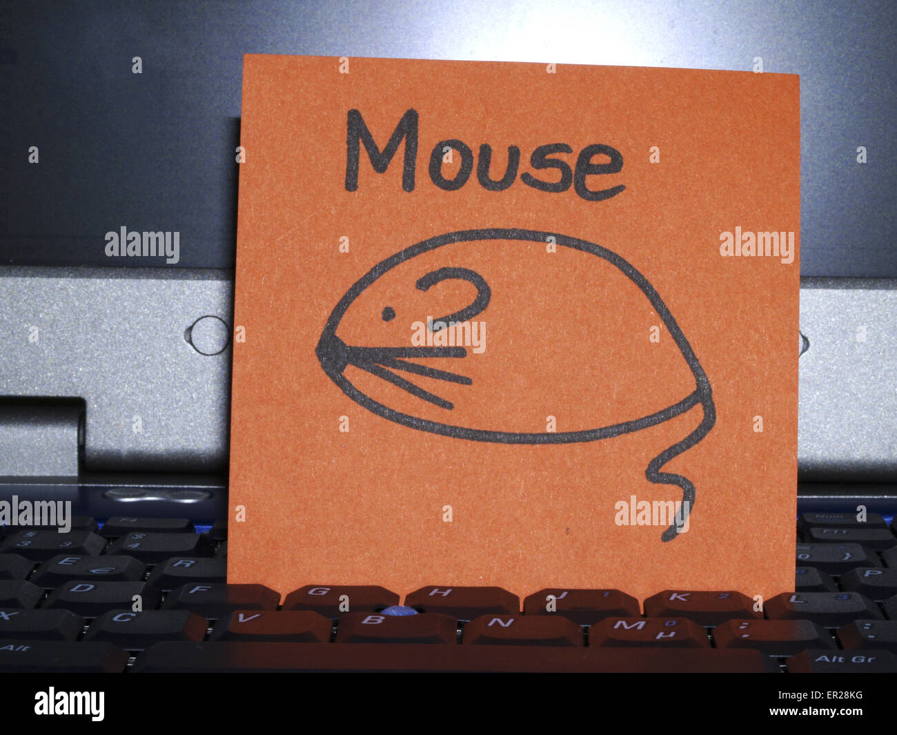 Memo note on notebook, mouse drawing computer mouse Stock Photo - Alamy