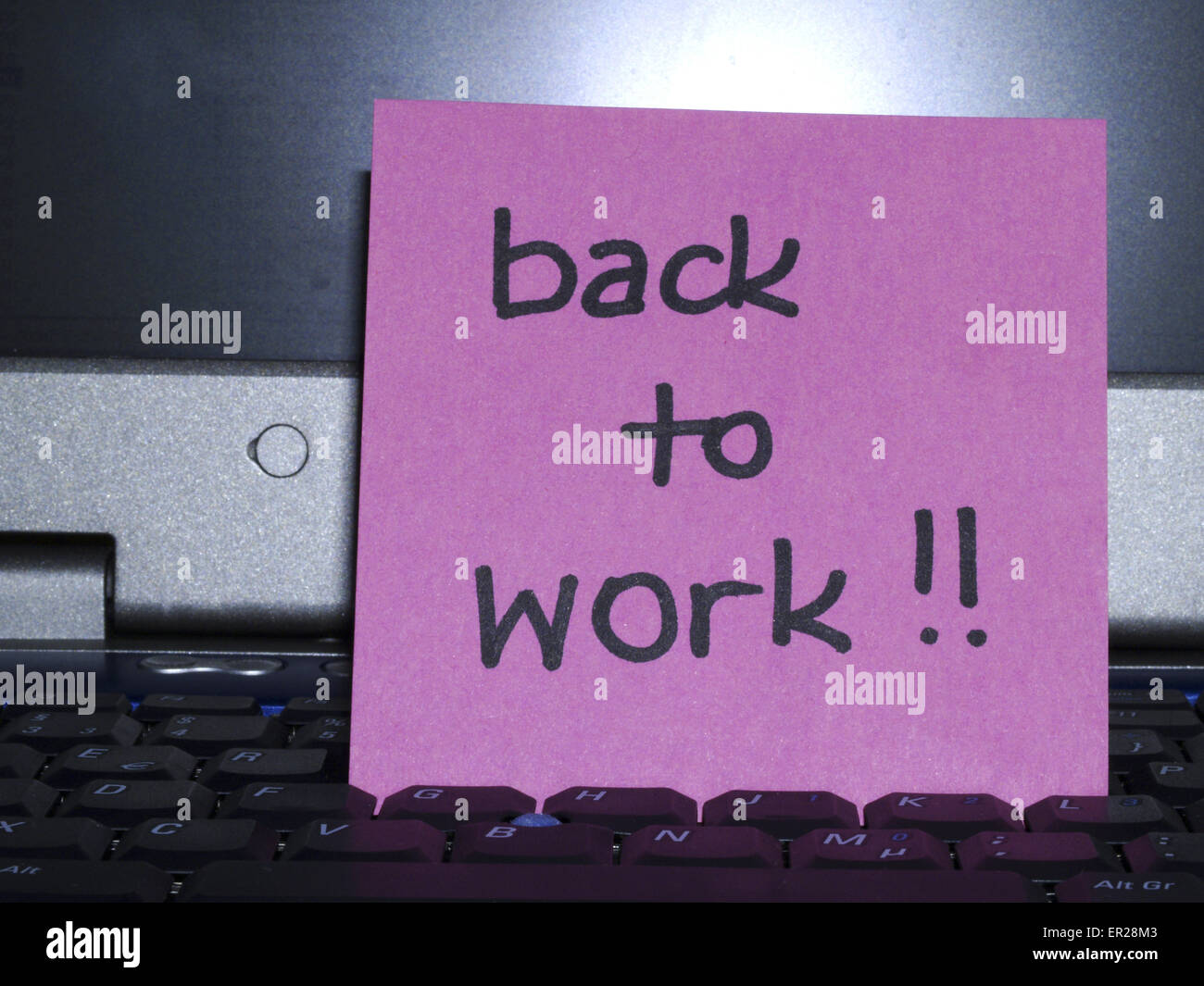 Memo note on notebook, back to work Stock Photo - Alamy