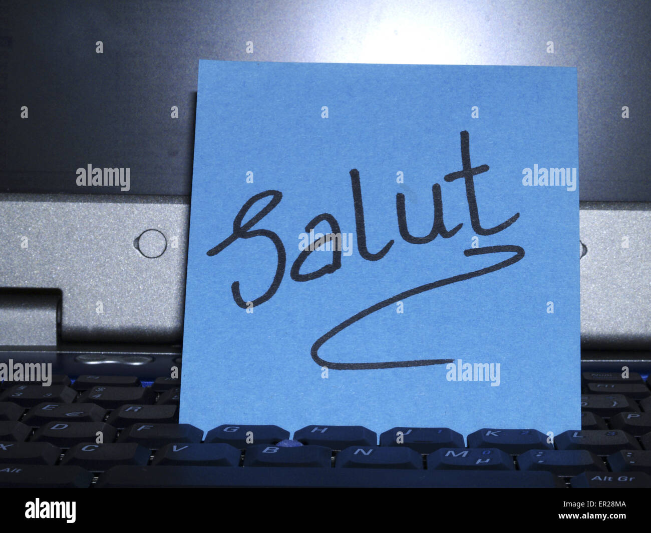 Memo note on notebook, salut, hello Stock Photo - Alamy