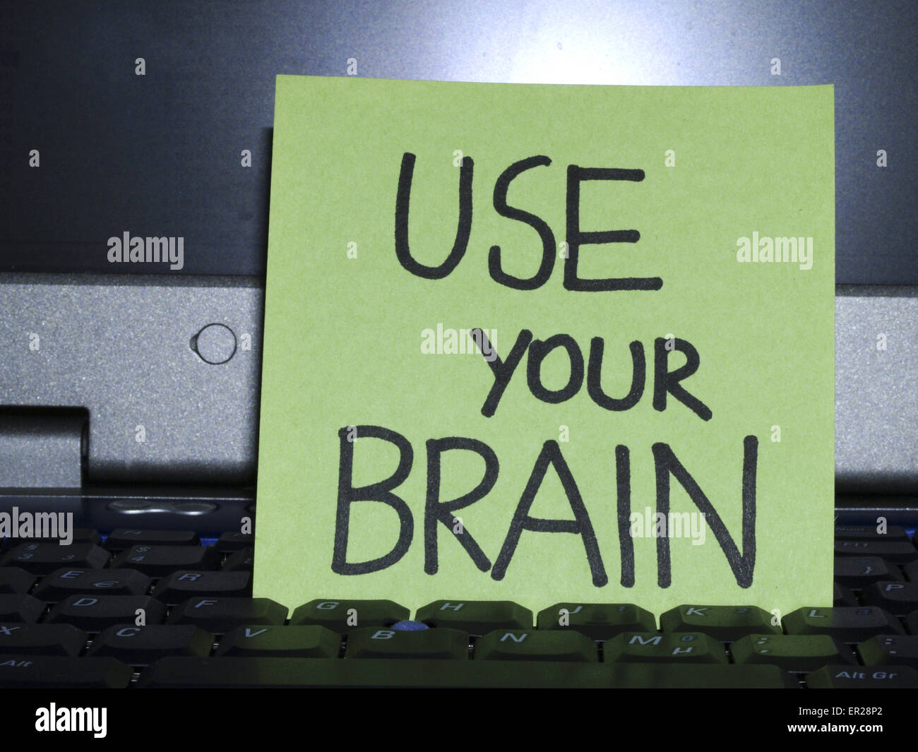 Memo note on notebook, use your brain Stock Photo - Alamy