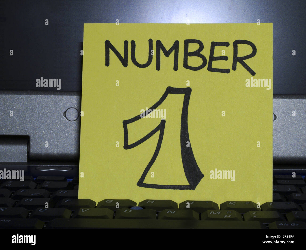 Memo note on notebook number one hi-res stock photography and images ...