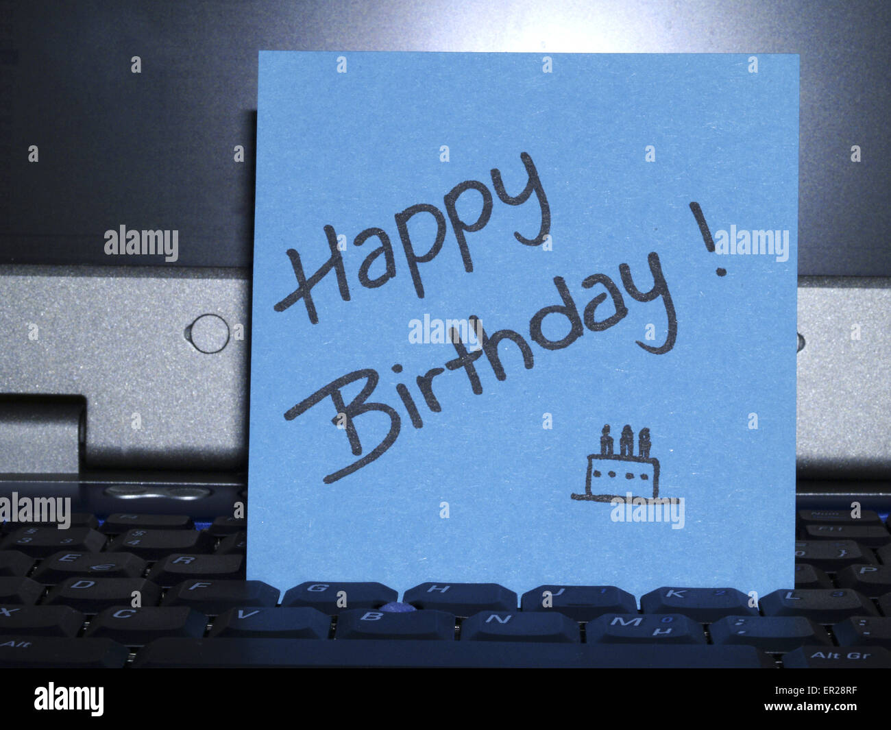 Memo note on notebook, Happy Birthday Stock Photo - Alamy