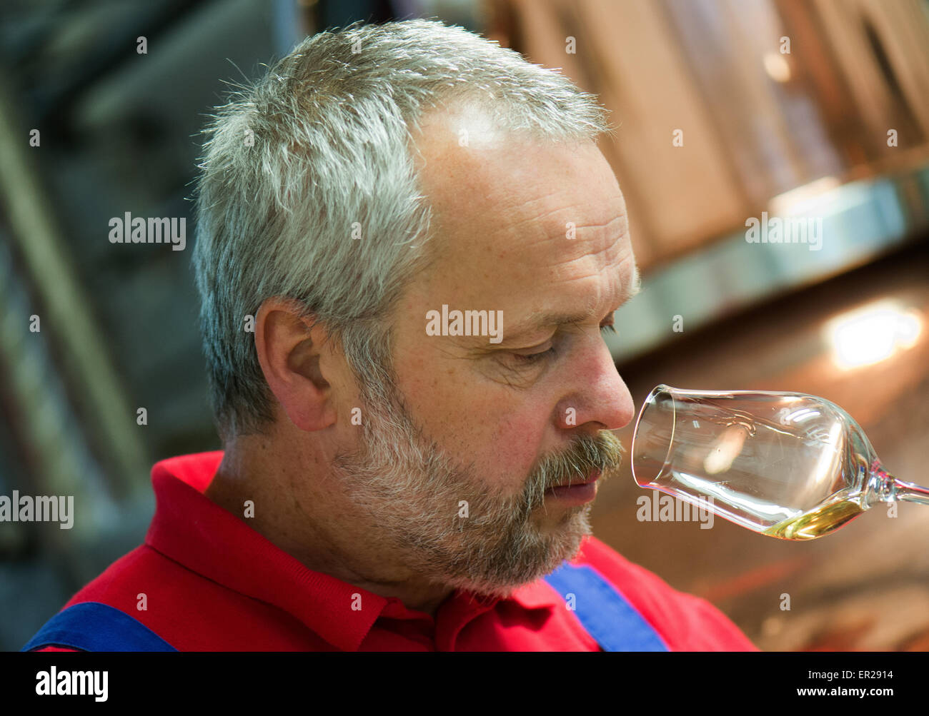 Klipphausen, Germany. 19th May, 2015. Master distiller Siegbert Henning ...