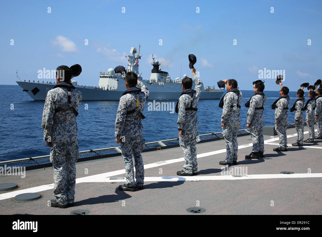 Singapore. 25th May, 2015. Soldiers and officers of Singapore Navy wave ...