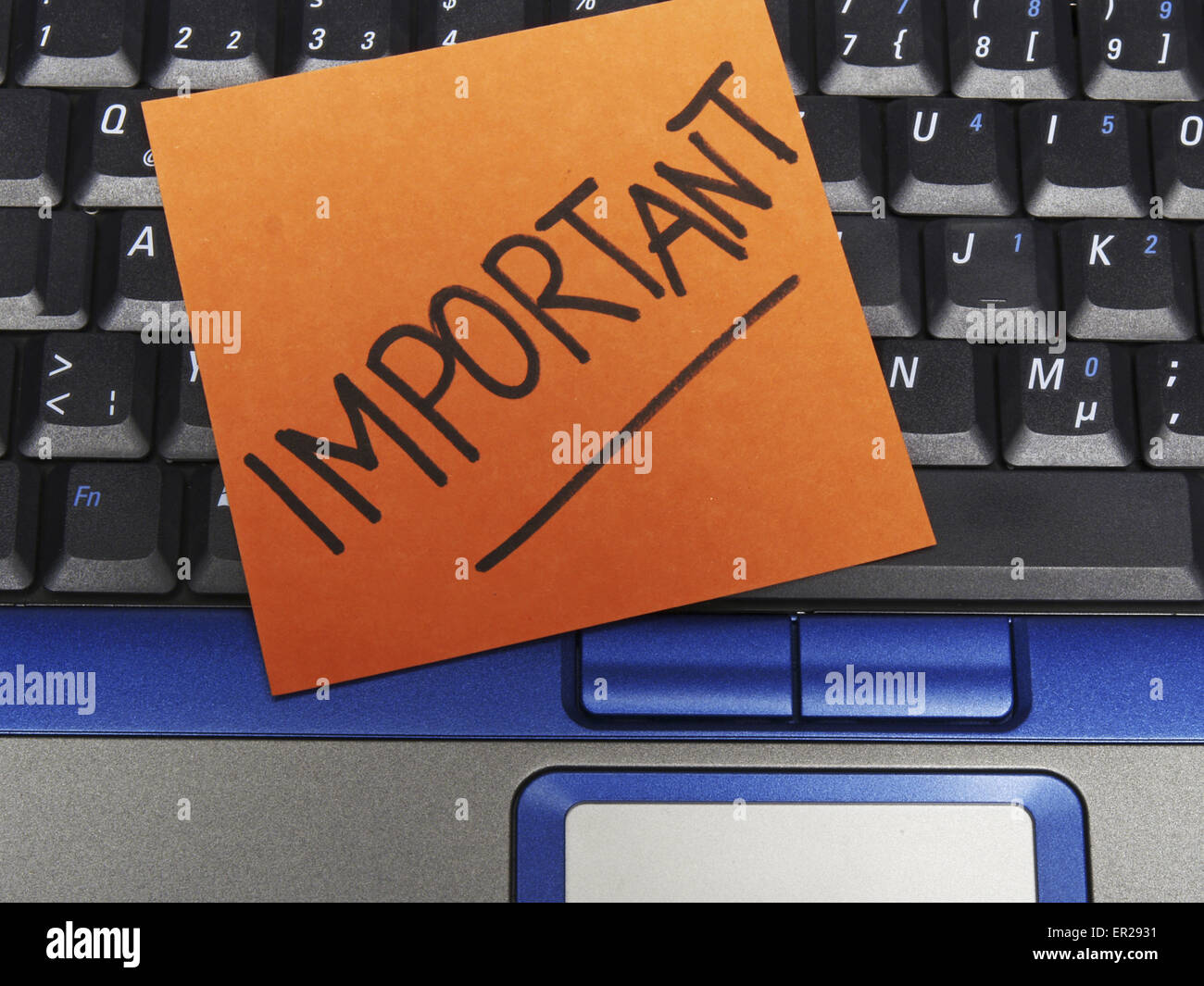 Memo note on notebook, important Stock Photo - Alamy