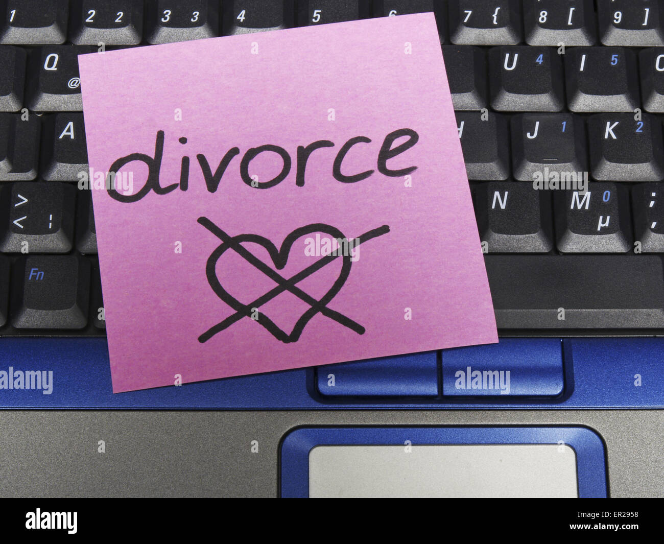Memo note on notebook, divorce Stock Photo - Alamy