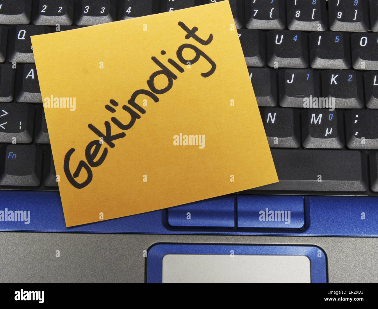 Memo note on notebook, canceled, fired Stock Photo - Alamy