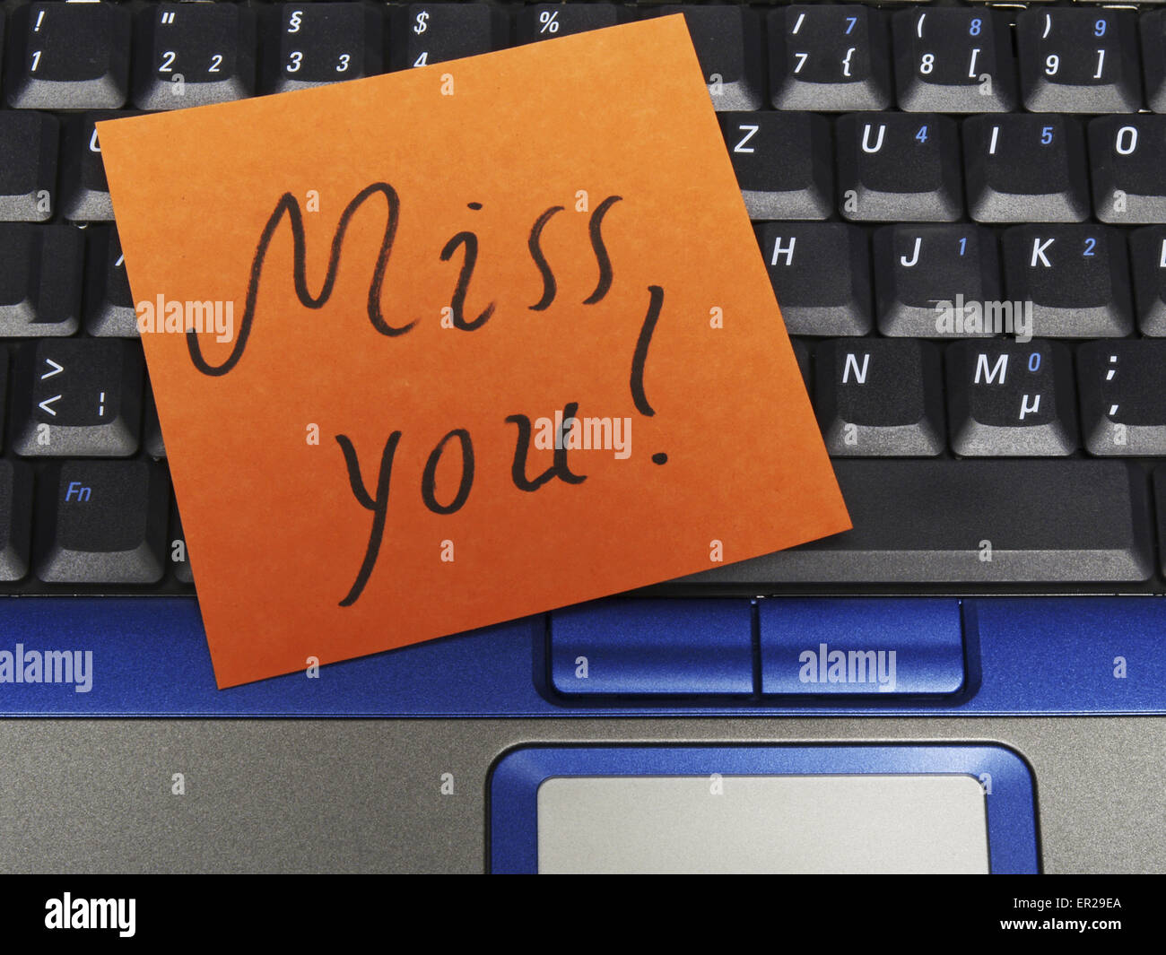 Memo note on notebook, miss you Stock Photo - Alamy