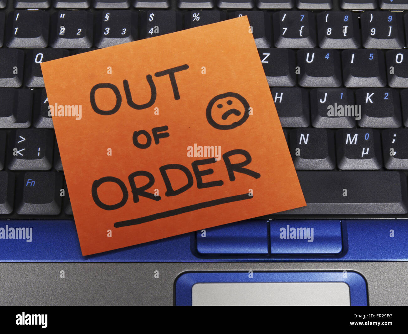 Memo note on notebook, out of order Stock Photo - Alamy