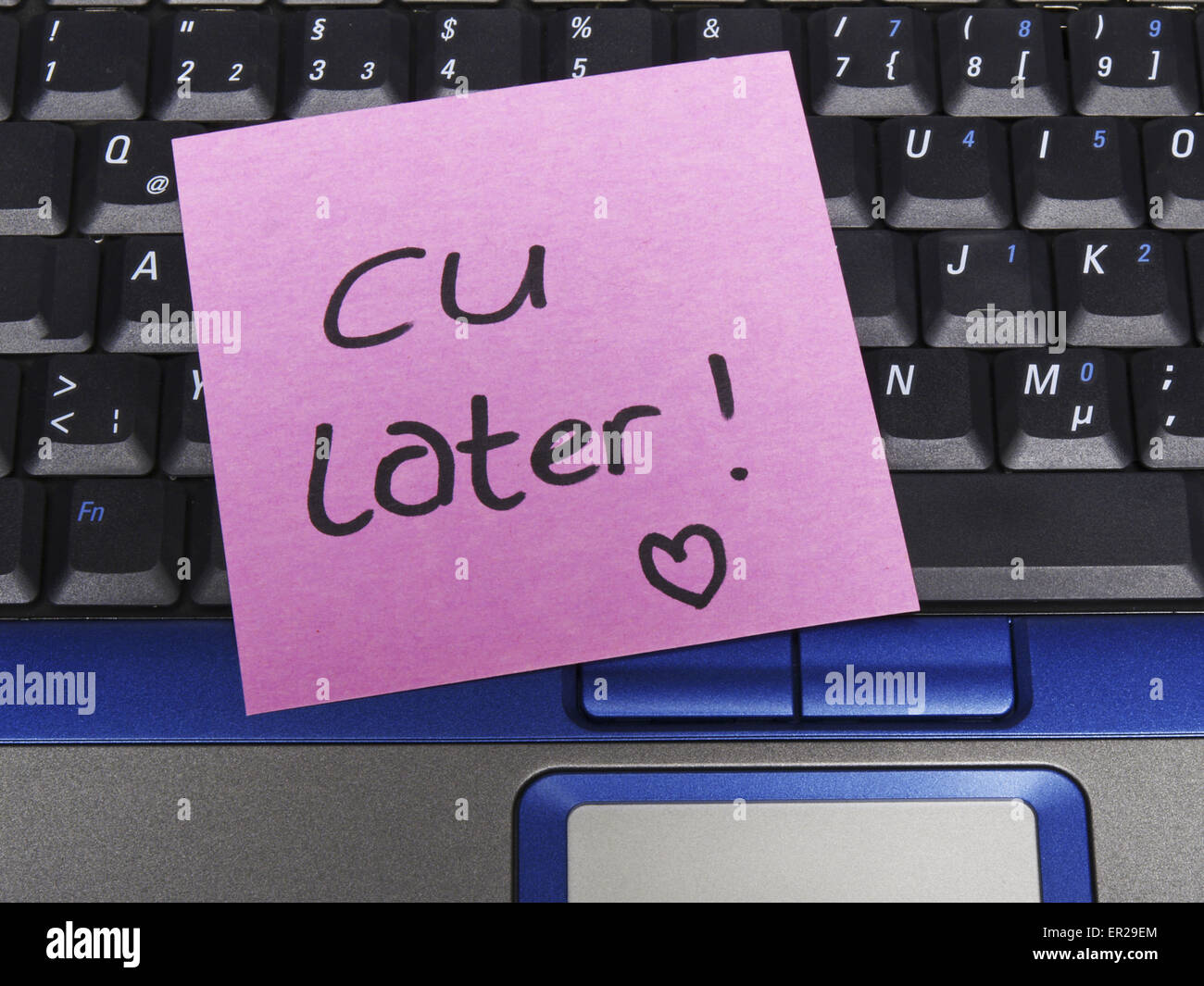 Memo note on notebook, cu later Stock Photo - Alamy