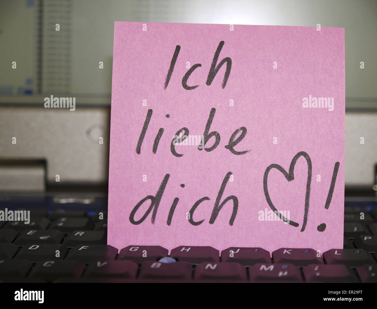 Memo note on notebook, Ich liebe dich, I love you with heart drawing ...