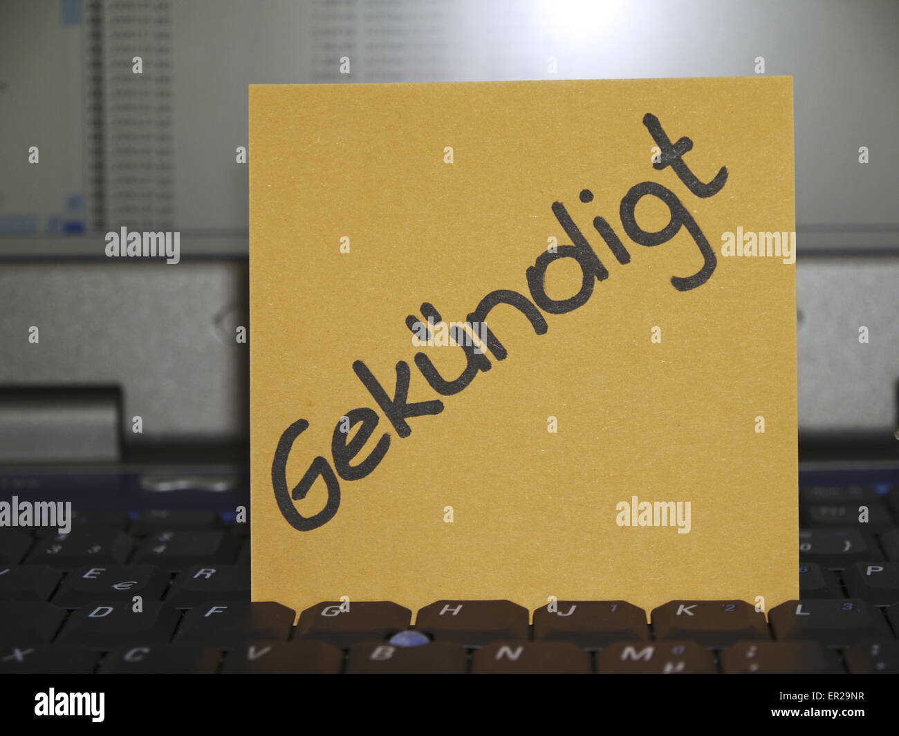 Memo note on notebook, canceled, fired Stock Photo - Alamy