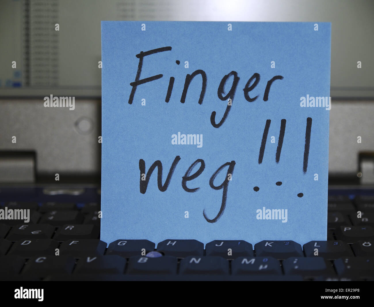 Memo note on notebook, hands off Stock Photo - Alamy