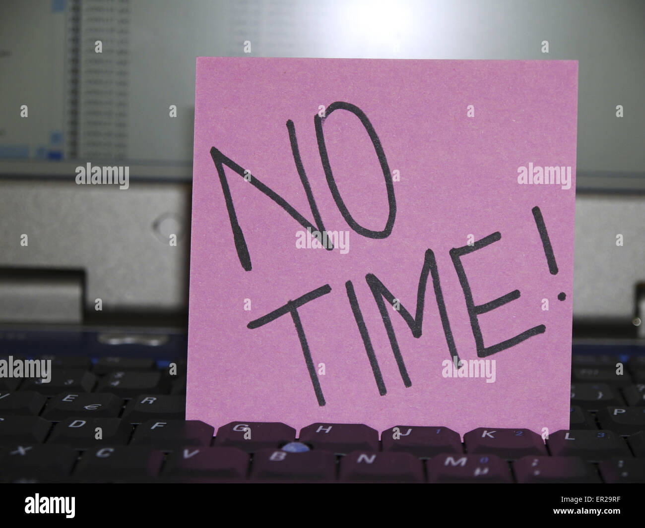 Memo note on notebook, no time Stock Photo - Alamy